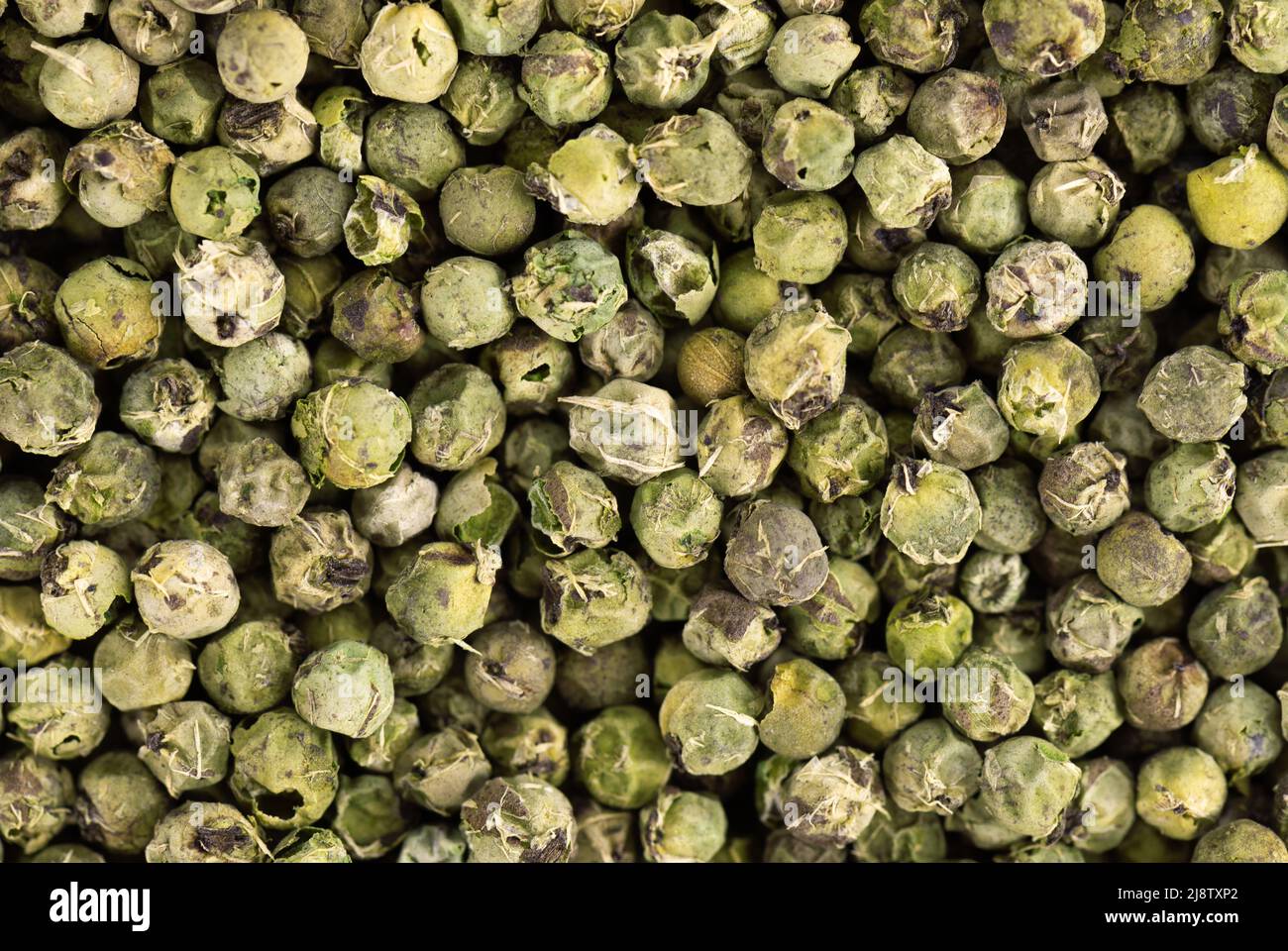 Green peppercorns background. Dry green pepper grain. Organic spice ...