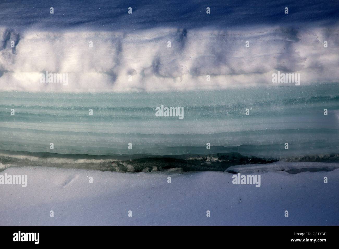 layers of ice exposed by river water Stock Photo - Alamy