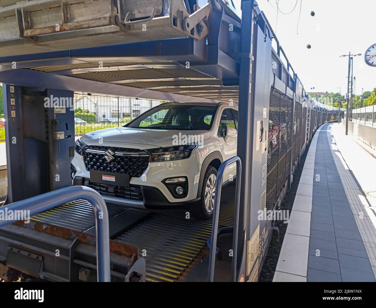 A view of a train with Suzuki cars loaded on special wagons Stock Photo ...