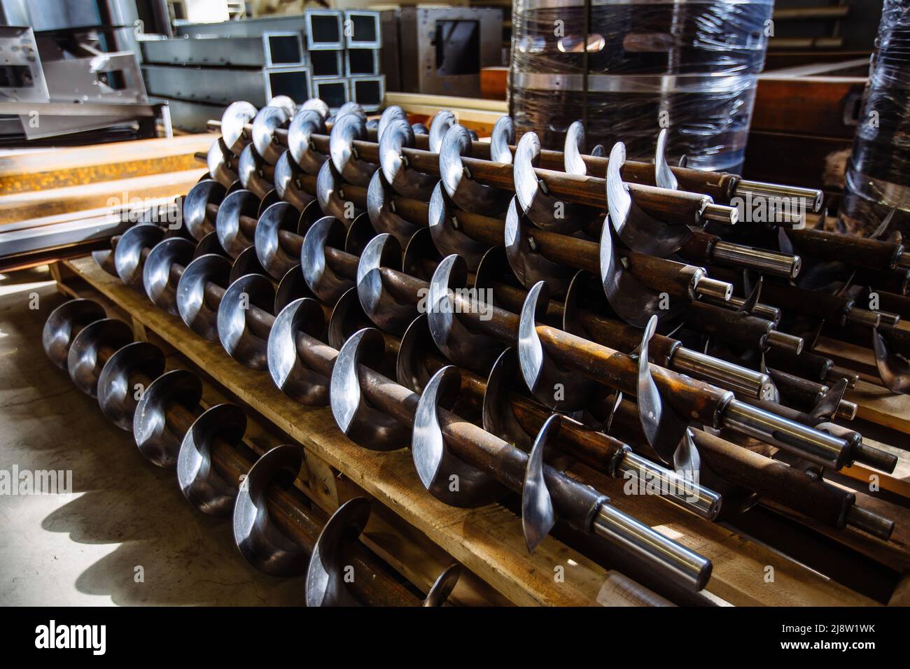 Augers. Screw machine parts in the factory Stock Photo - Alamy