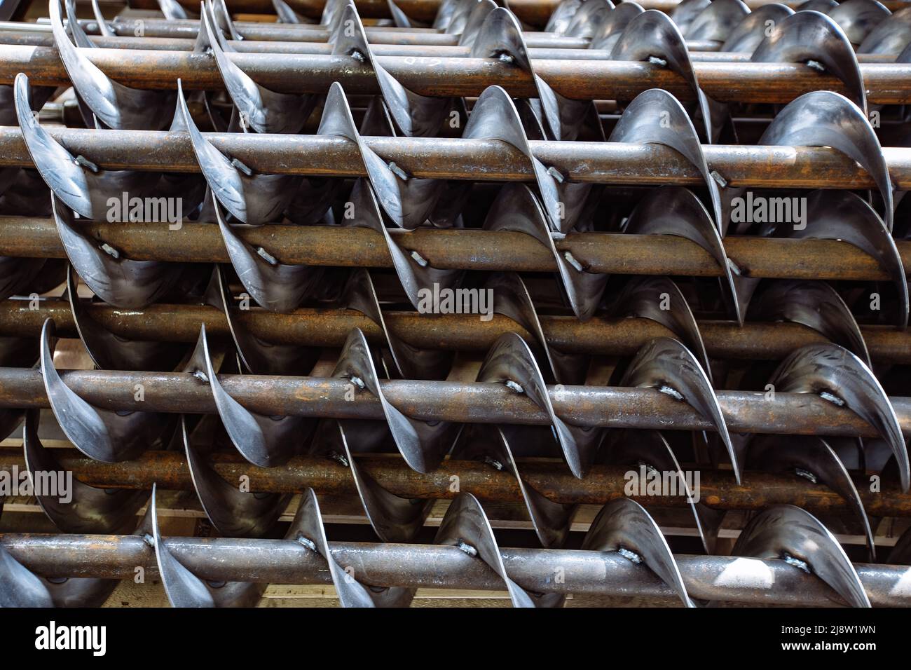 Augers. Screw machine parts in the factory Stock Photo - Alamy