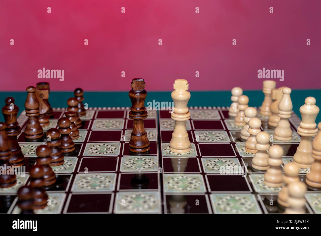 Two kings met on a chess board Stock Photo - Alamy