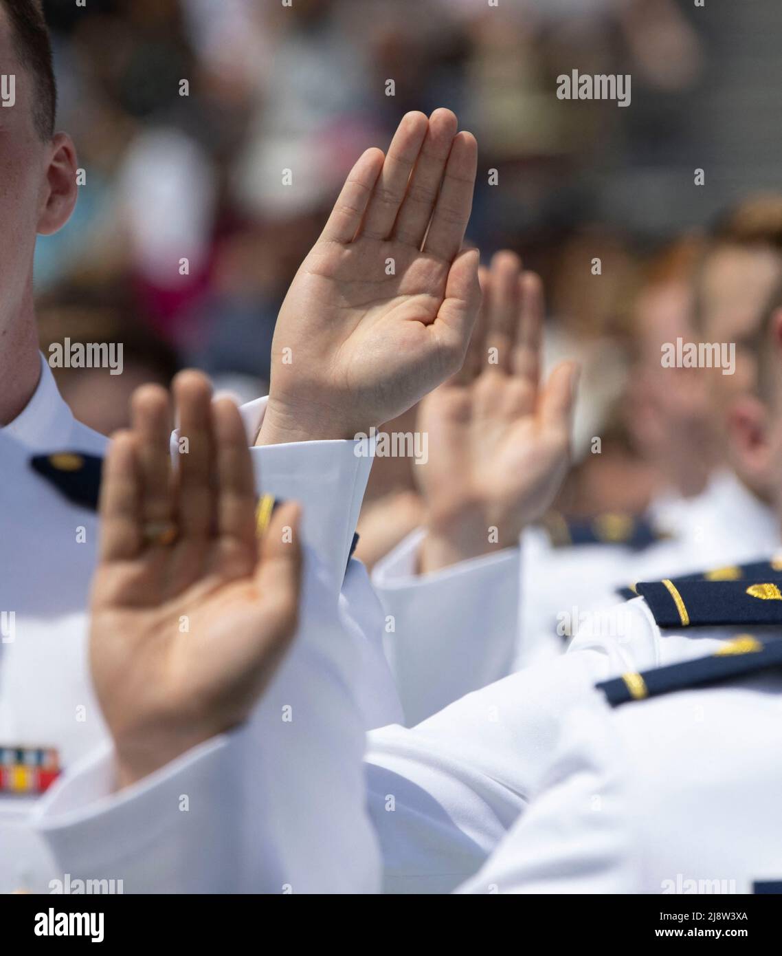 United States Coast Guard cadets take their oath during the United ...