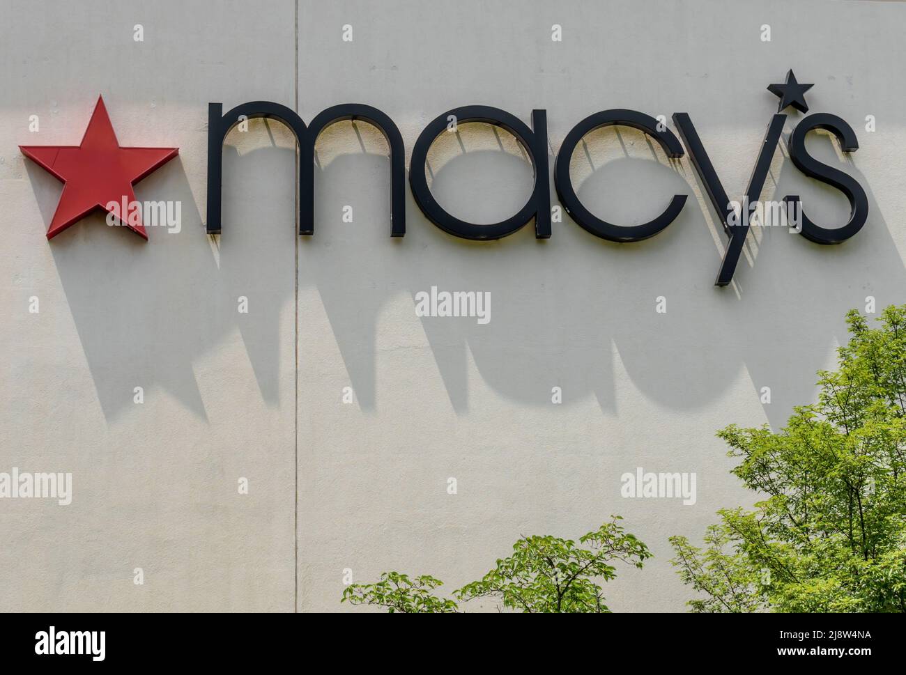 Exterior facade brand and logo signage for "Macy's" department store at ...
