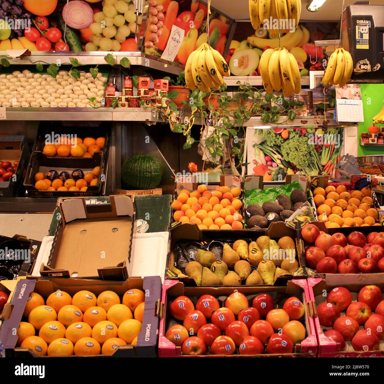 Colourful food market stall at Triana market in Seville in Andalusia in ...