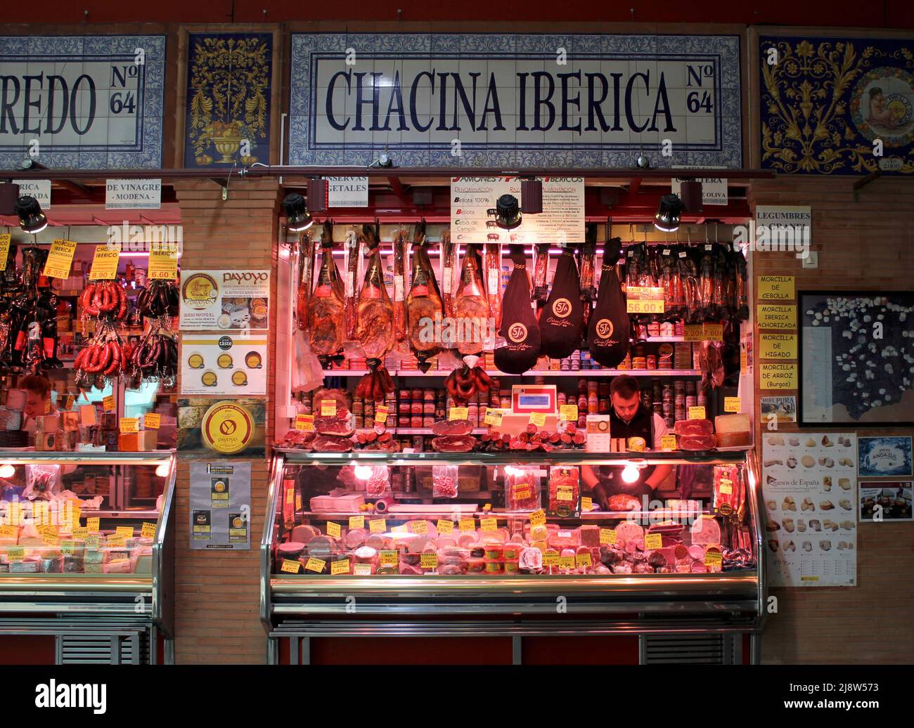 Colourful food market stall at Triana market in Seville in Andalusia in ...