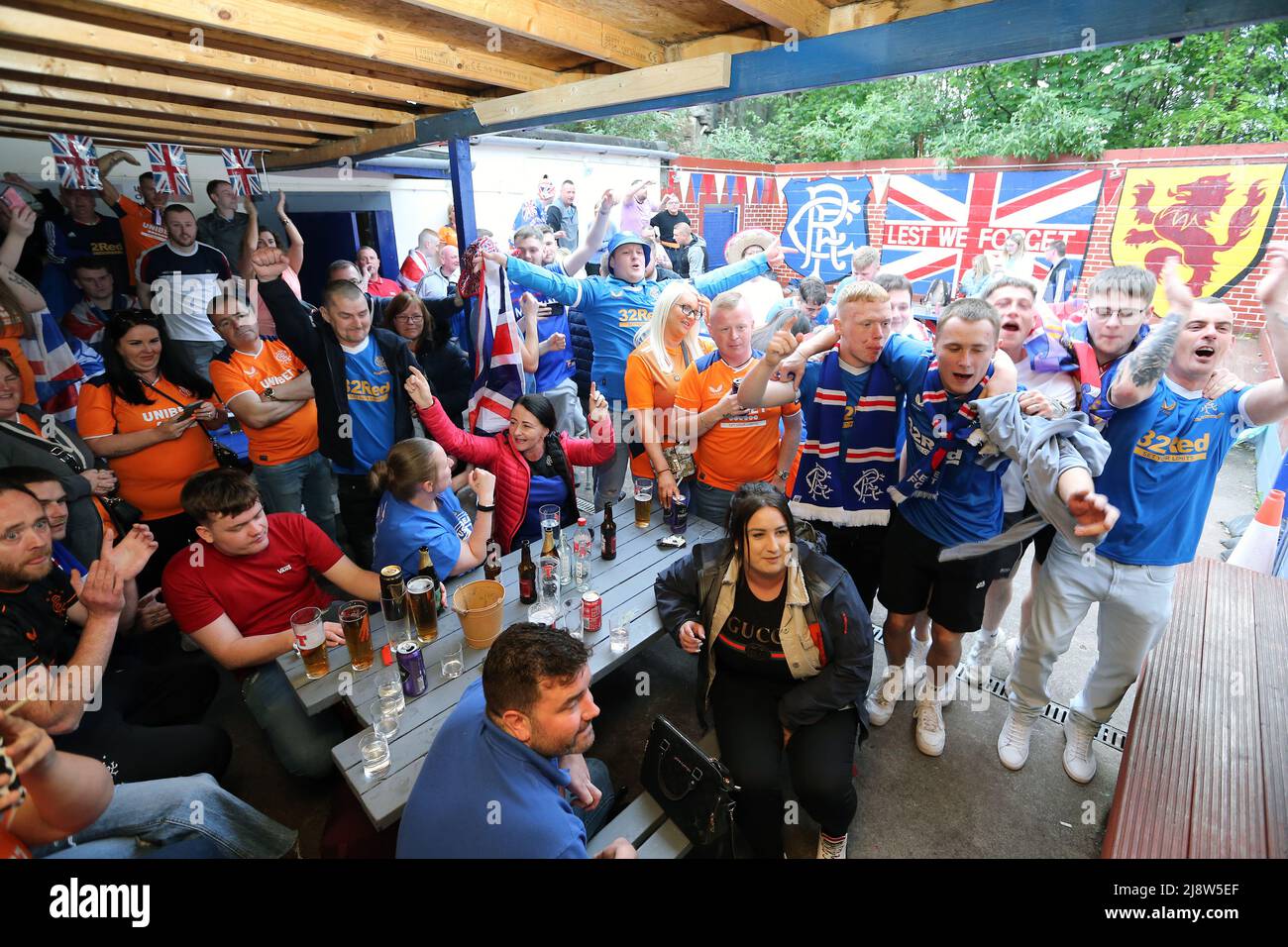 Rangers fans in the The Louden Tavern pub, Glasgow, watch Rangers play ...