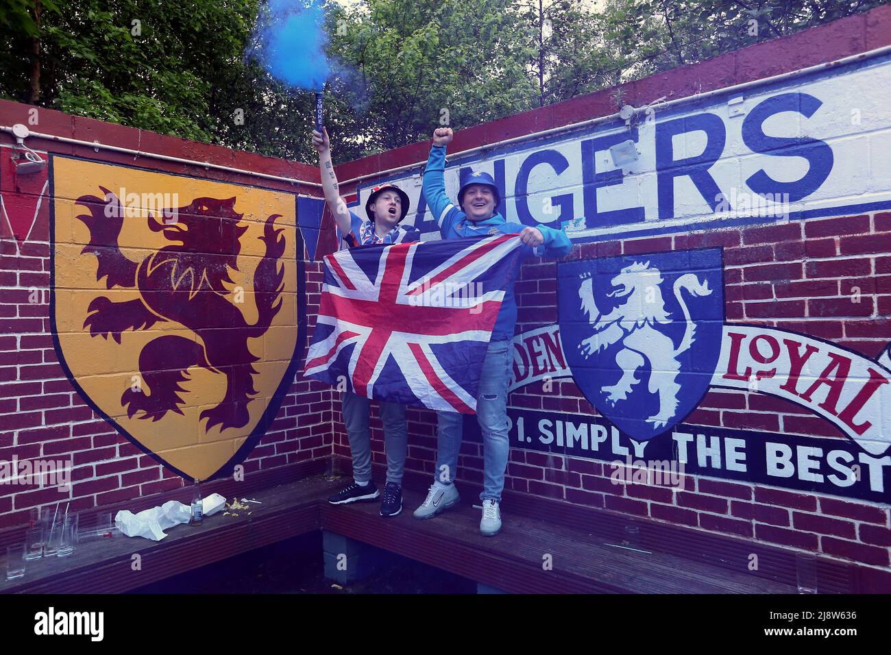 Rangers fans in the The Louden Tavern pub, Glasgow, watch Rangers play ...