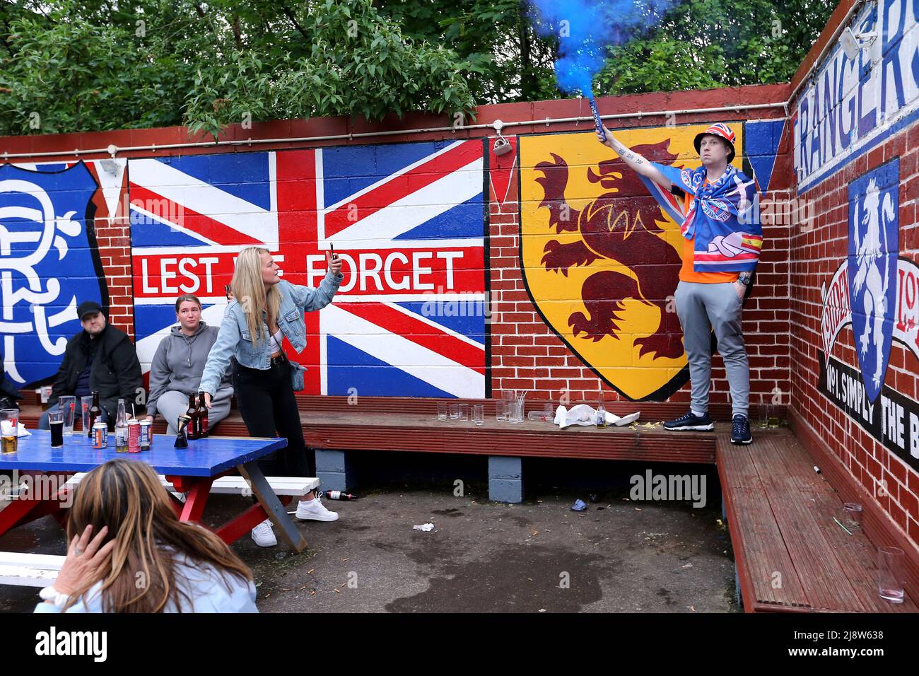 Rangers fans in the The Louden Tavern pub, Glasgow, watch Rangers play ...