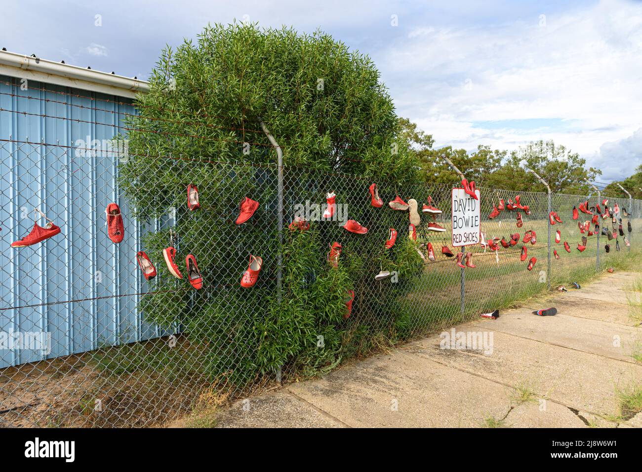 The David Bowie Red Shoes memorial / artwork on a fence at the swimming ...