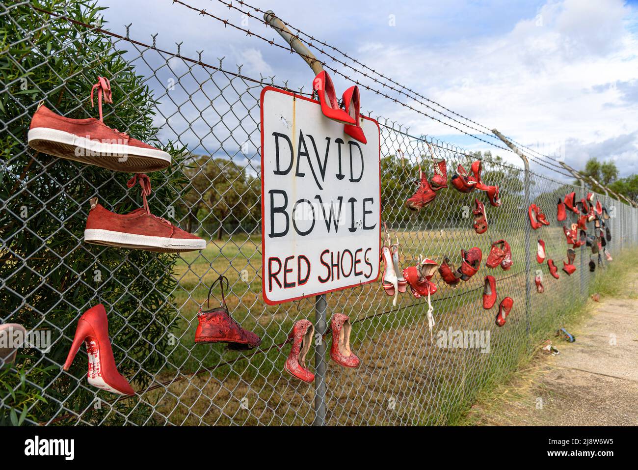 The David Bowie Red Shoes memorial / artwork on a fence at the swimming ...