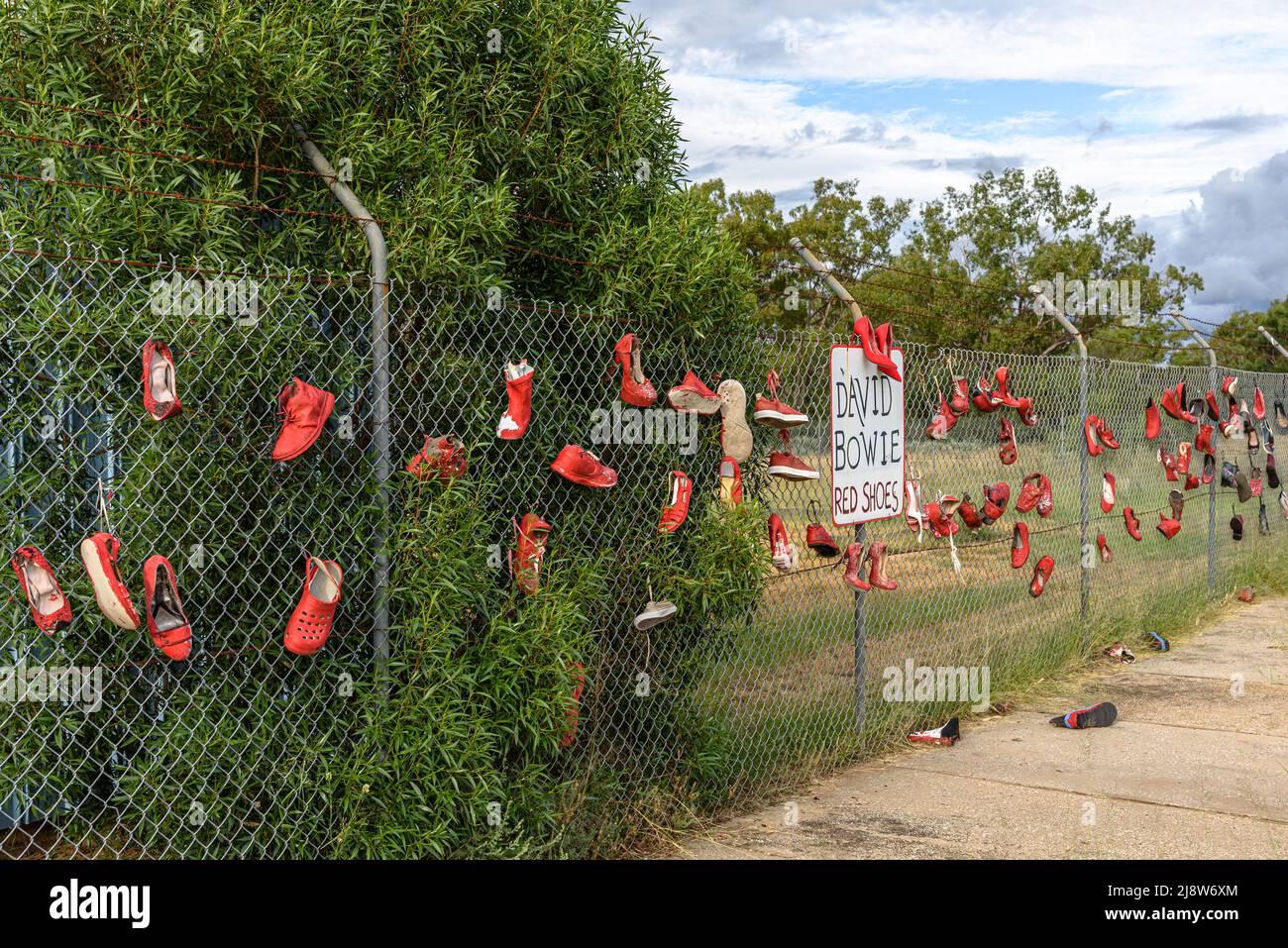 The David Bowie Red Shoes memorial / artwork on a fence at the swimming ...