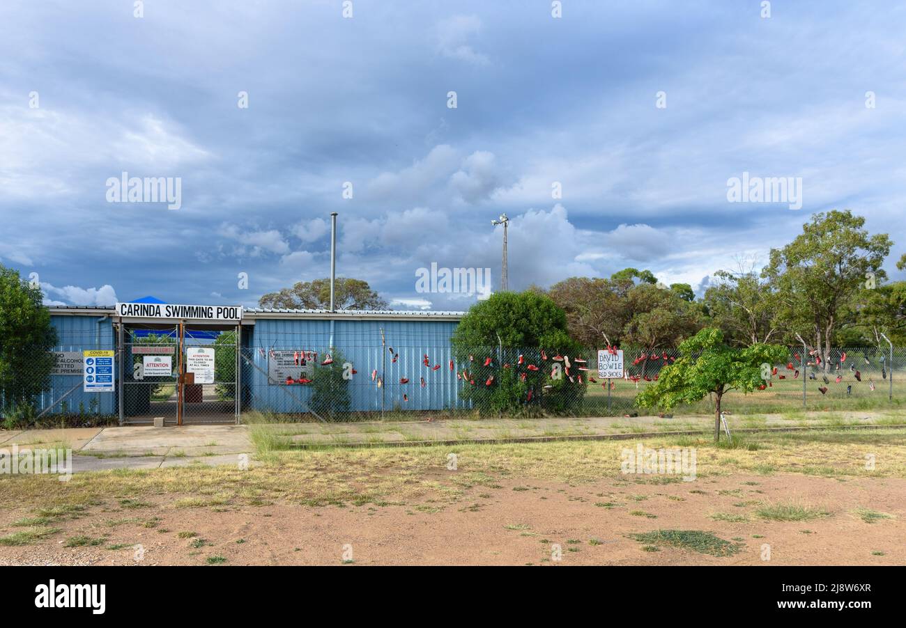 The David Bowie Red Shoes memorial / artwork on a fence at the swimming ...