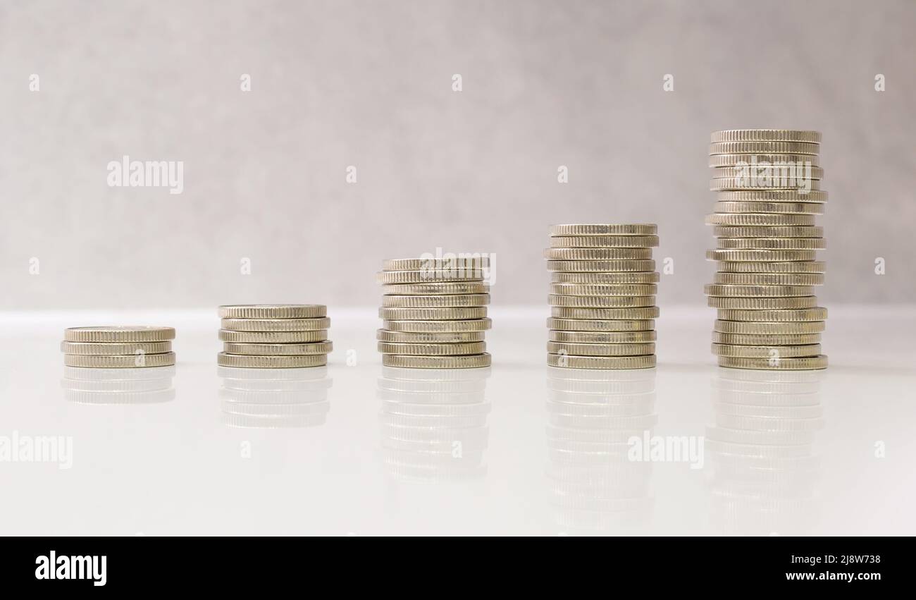 Financial graph from columns of coins a symbol of profitability. Coins ...