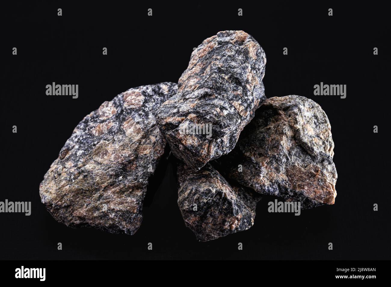 granite or crushed stone, ore used industrially in paving and ...