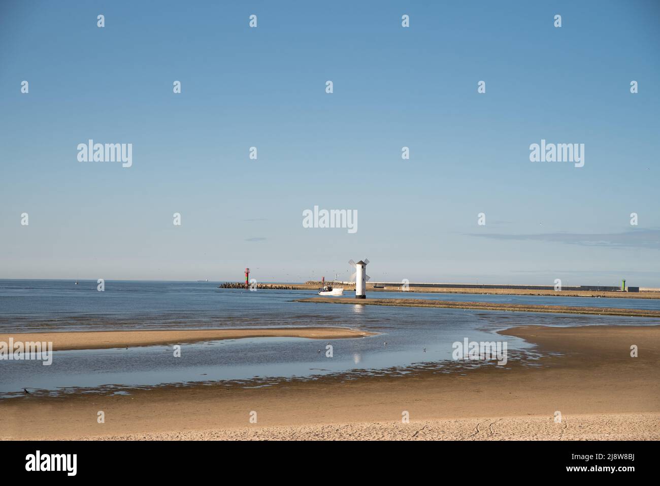 Old lighthouse in Swinoujscie, a port in Poland on the Baltic Sea. The ...