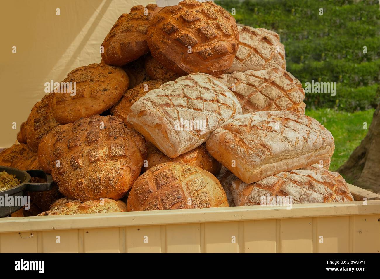 Loaves of a fresh artisan bread. home baking bread. big loaves of bread ...