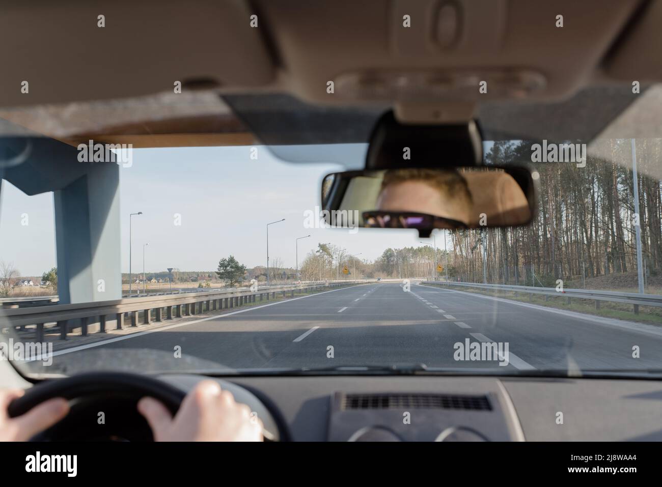 guy driving a car .Young man driving a car, interior shot . driving ...