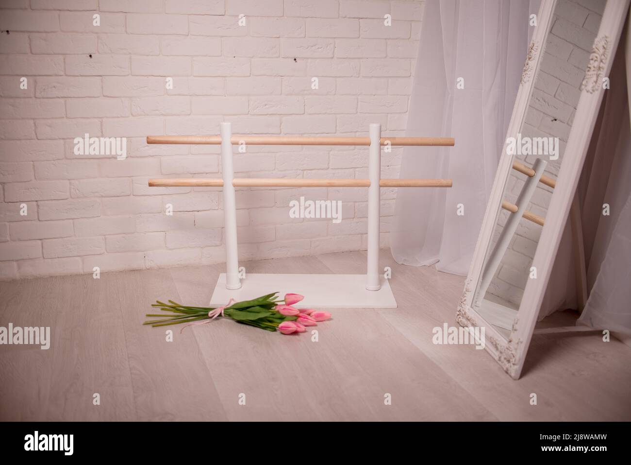 Ballet teacher and little ballerina have practice in dance class ...