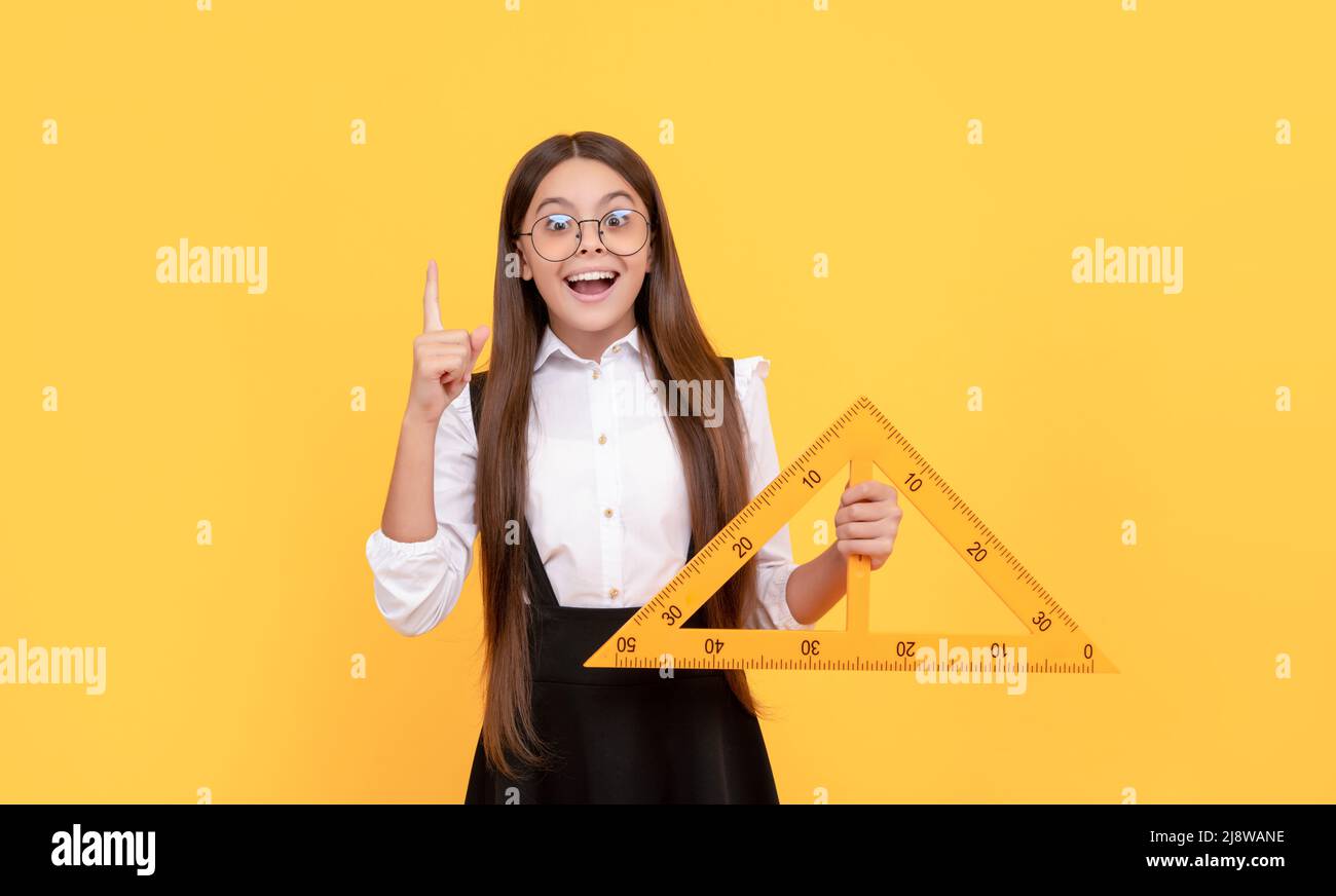 inspired with idea teen girl hold triangle. back to school. algebra and ...