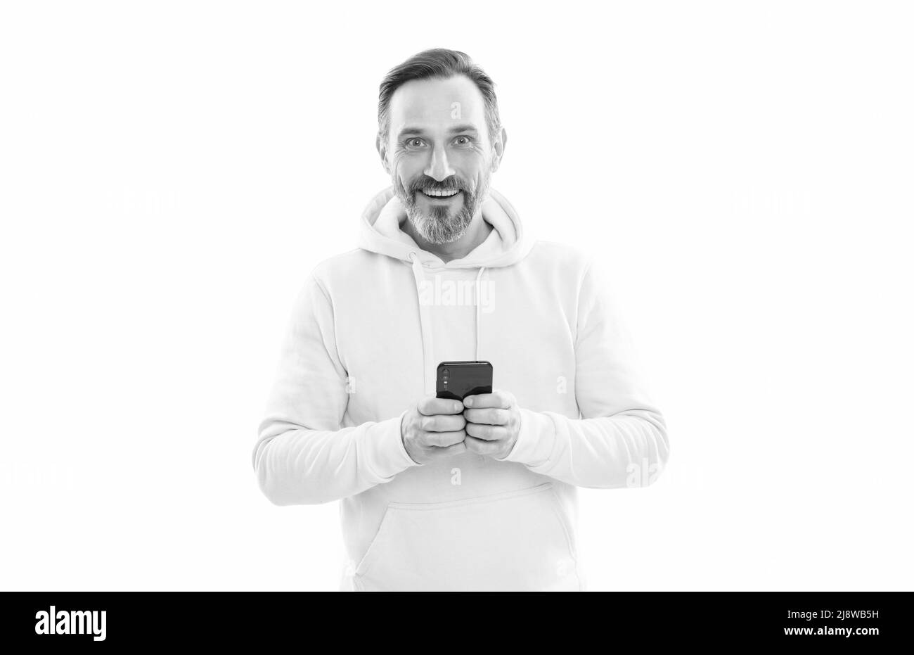 senior guy texting and messaging on smartphone isolated on white. guy ...
