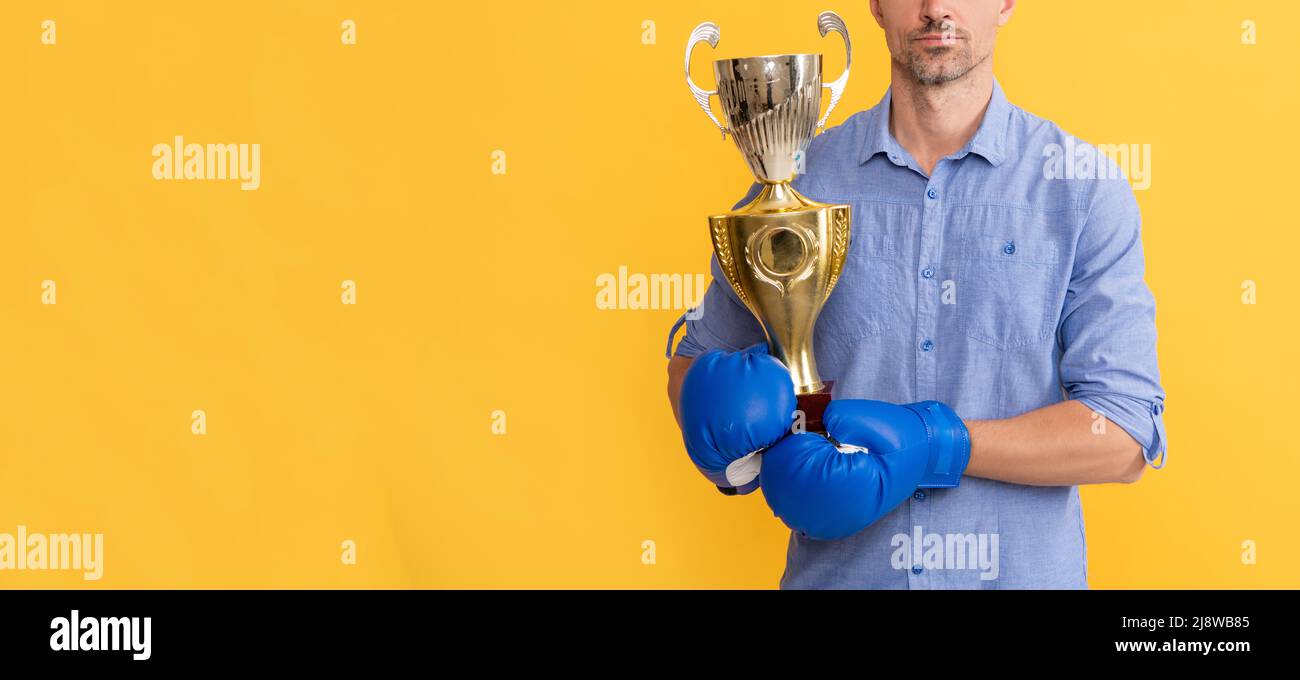 successful boxer hold golden cup. confident man ready for battle ...