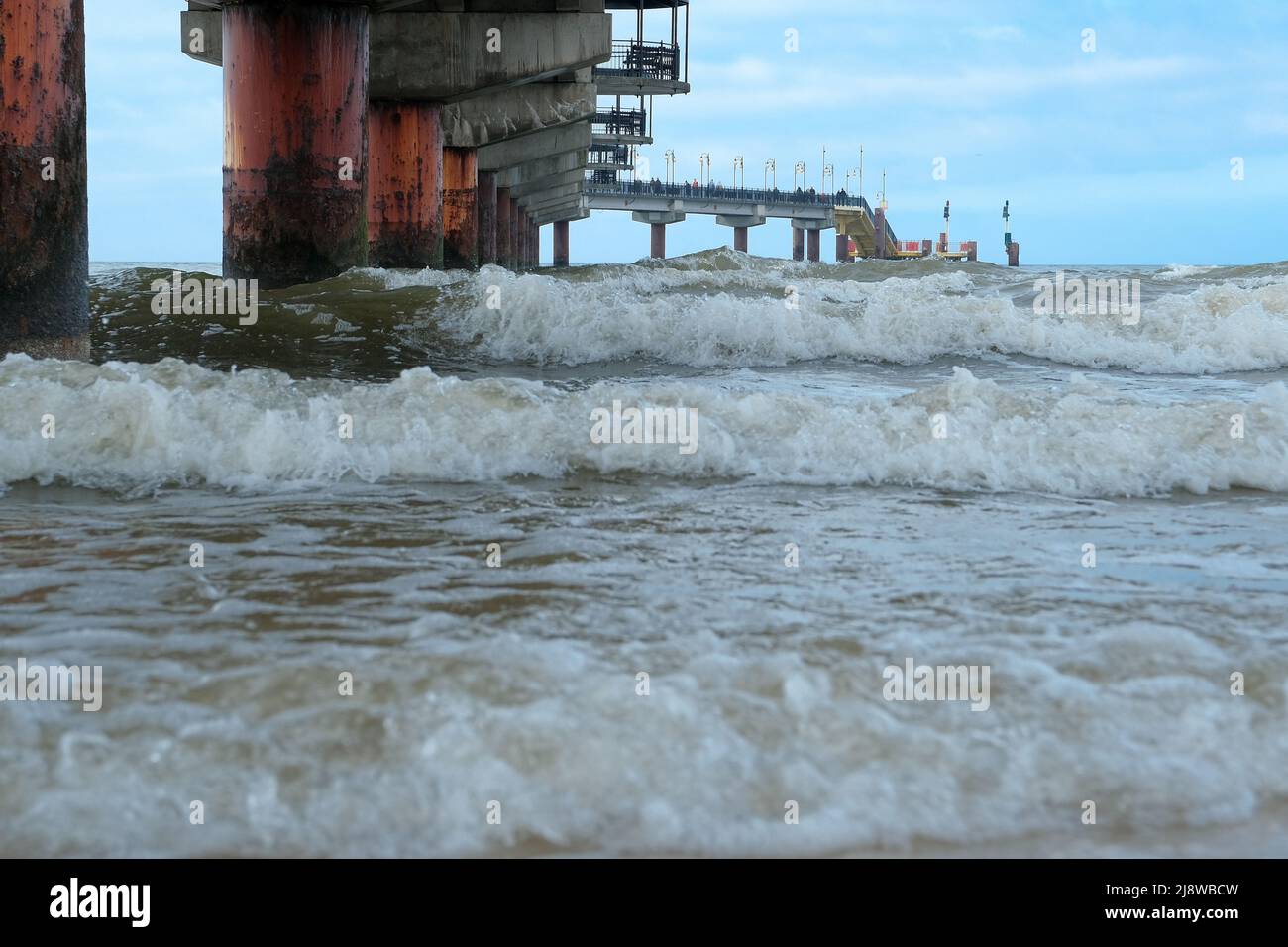 bridge extending into the distance of the sea. beautiful view of the ...