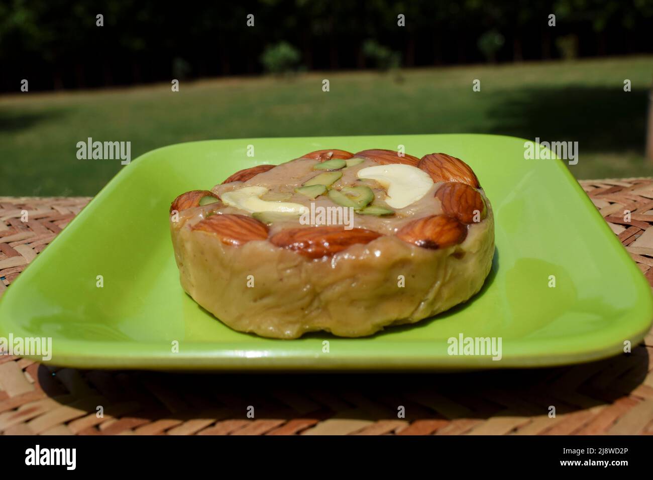 Side view of Delicious Soan halwa or Sohan halawa sweets dessert Stock ...