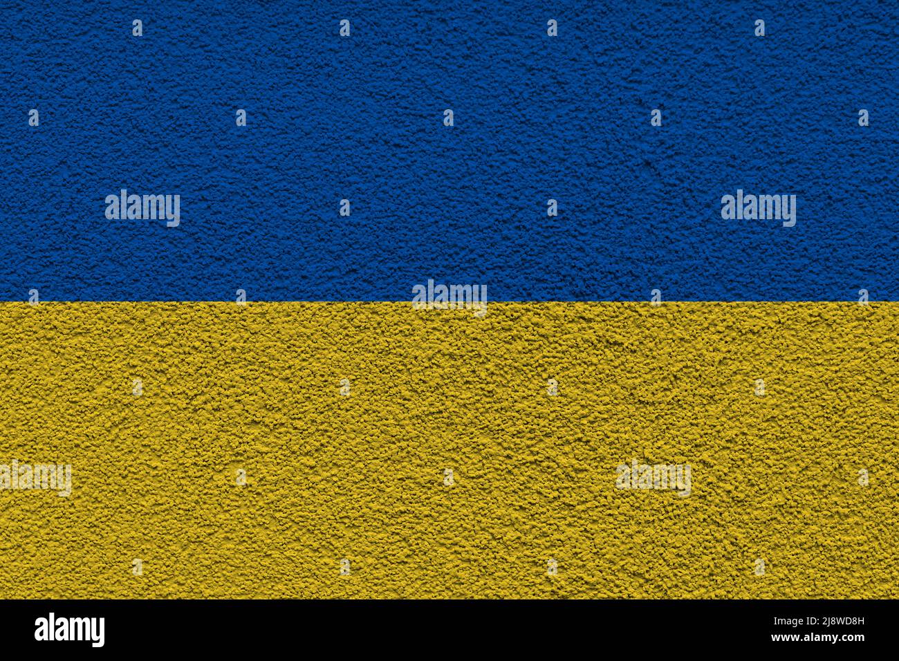 Ukrainian state national flag. Texture concrete grunge wall in yellow ...