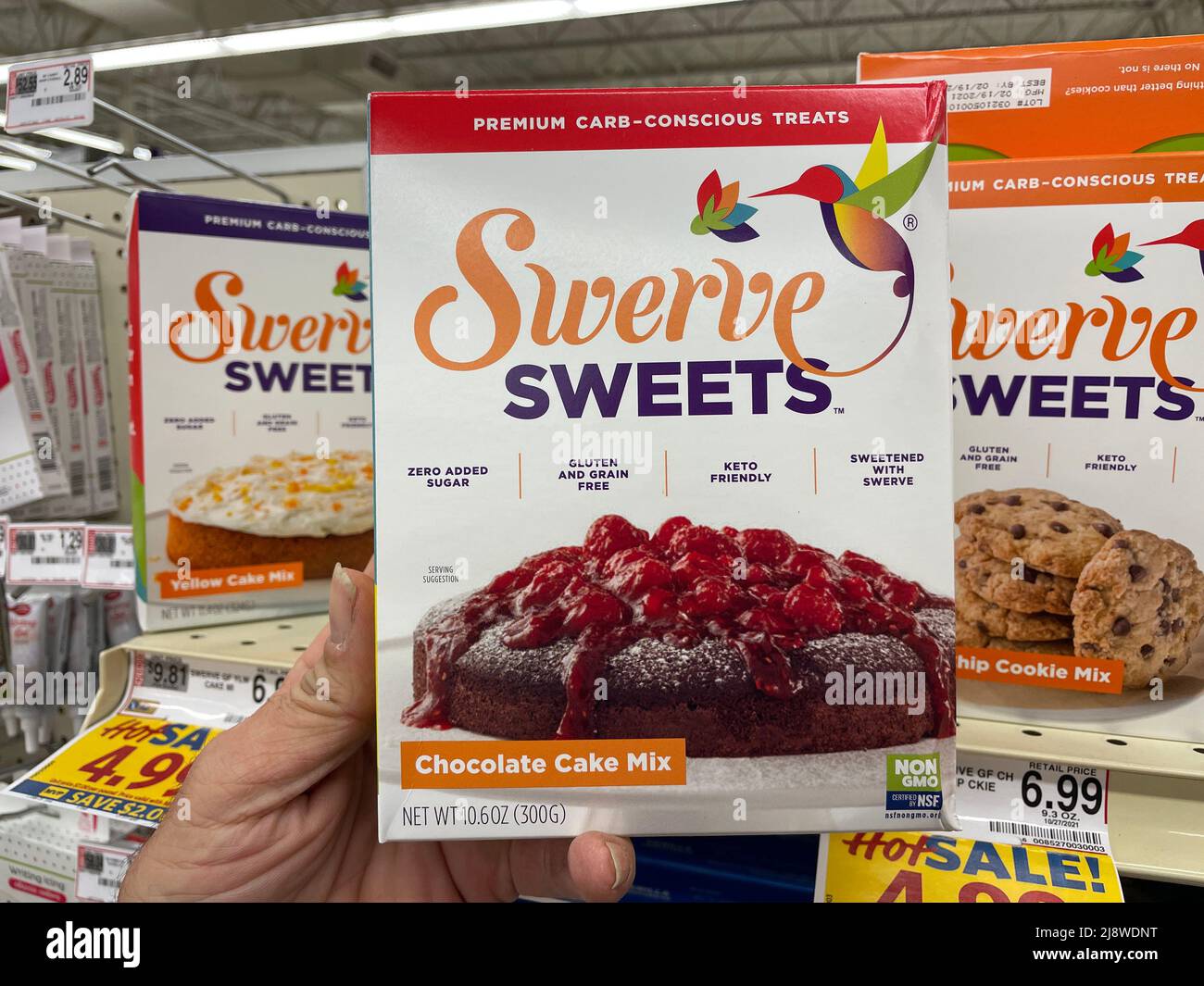 Holding sweets packaging hi-res stock photography and images - Alamy