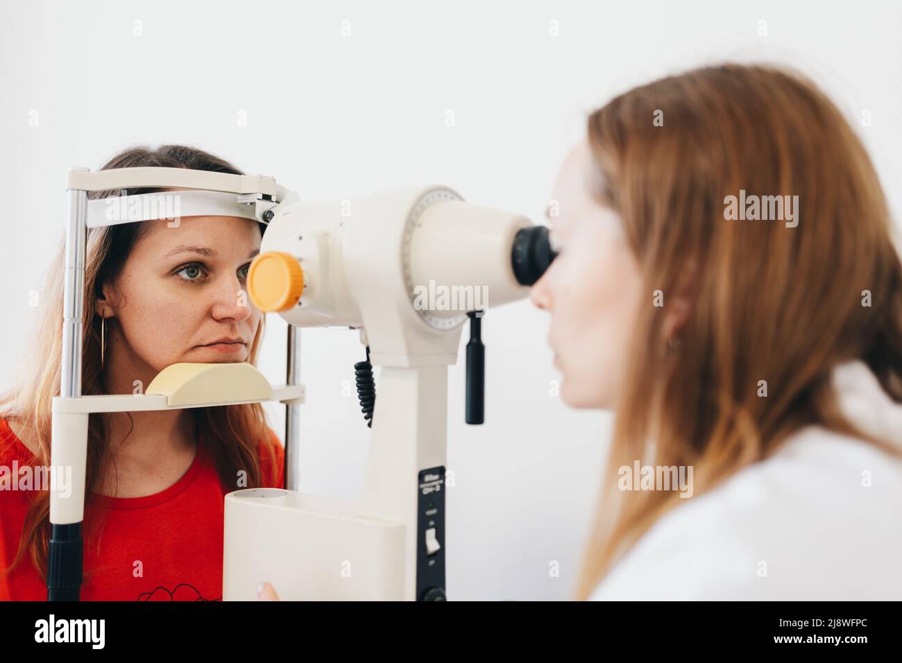 Eye test for visual acuity. The patient receives eye consultation Stock ...