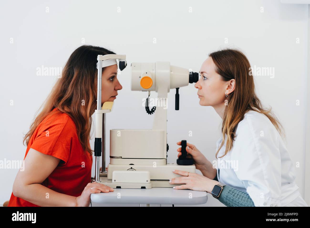 Eye test for visual acuity. The patient receives eye consultation Stock ...