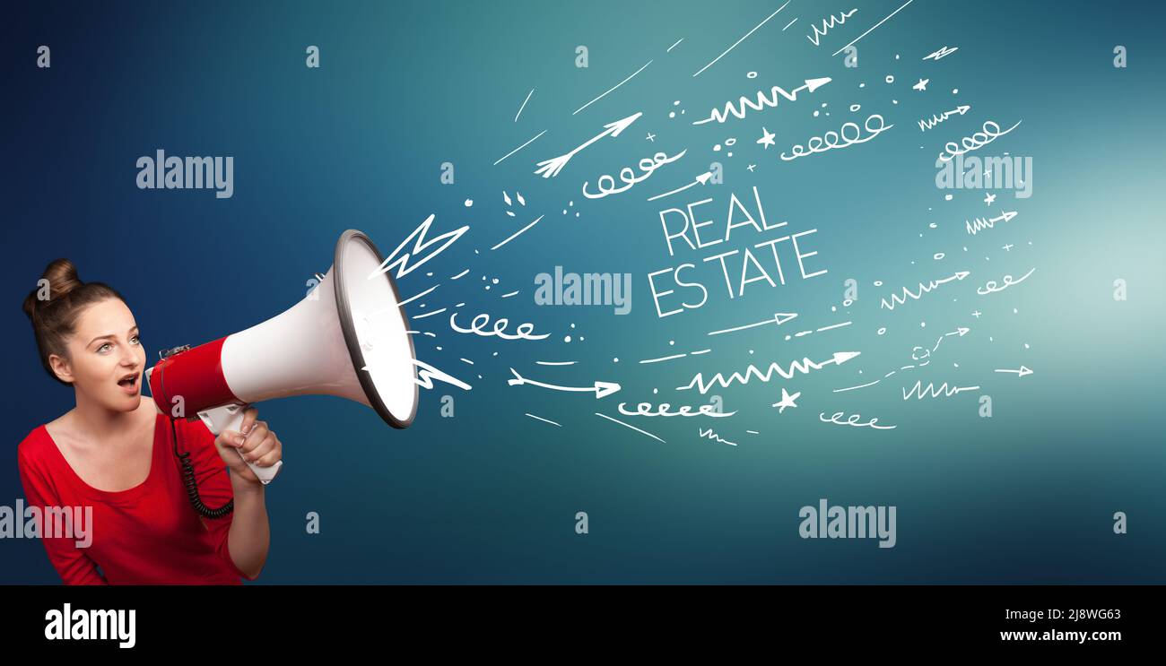 Young girl screaming to megaphone Stock Photo - Alamy