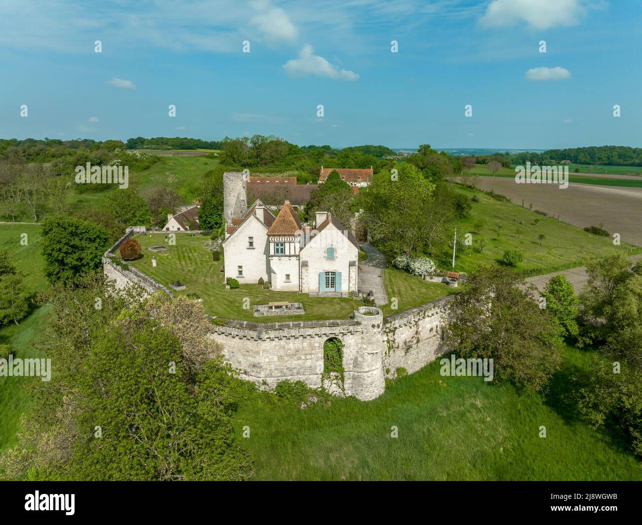 Aerial view of Poncenat castle in central France surrounded by a wall ...