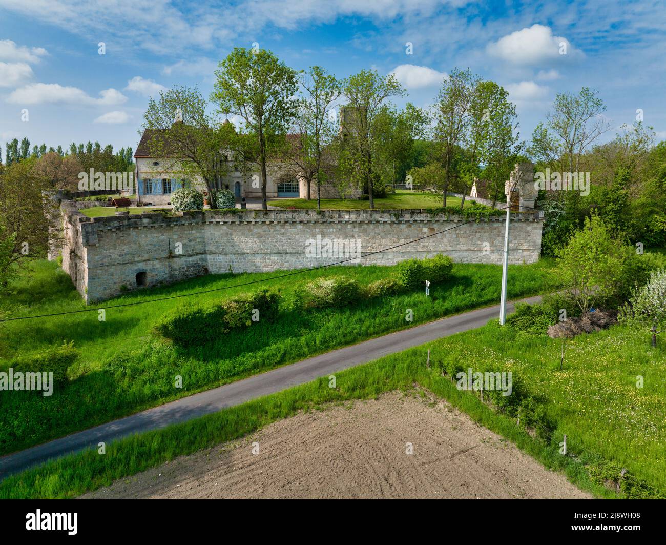 Aerial view of Poncenat castle in central France surrounded by a wall ...
