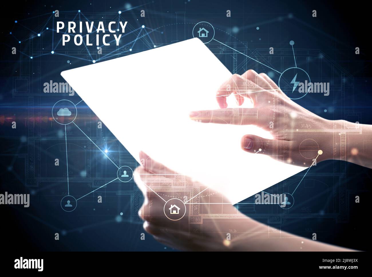 Holding futuristic tablet, security concept Stock Photo - Alamy