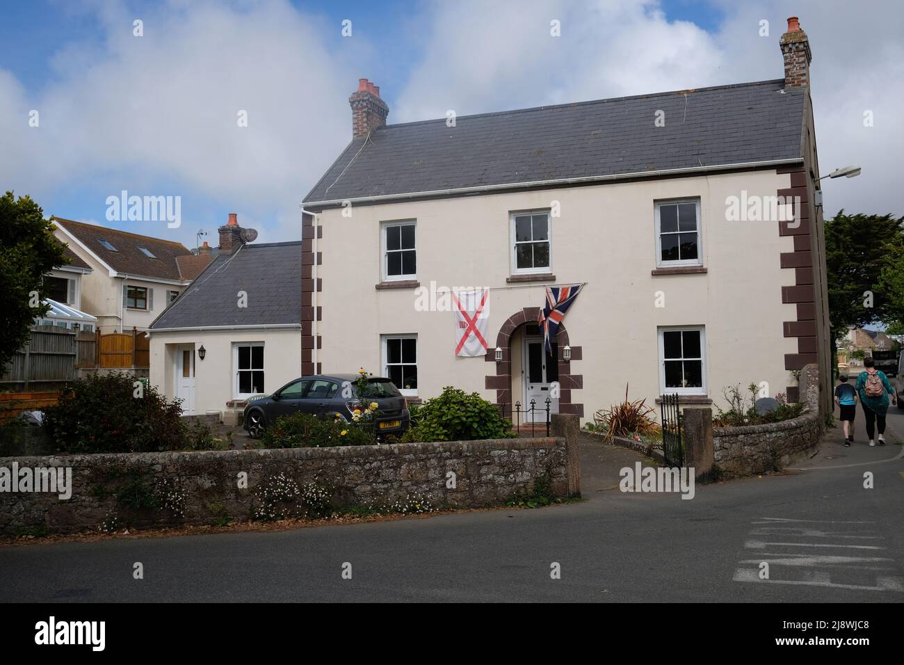 A large house in St Peters, Jersey, Channel Islands, flying large Union ...