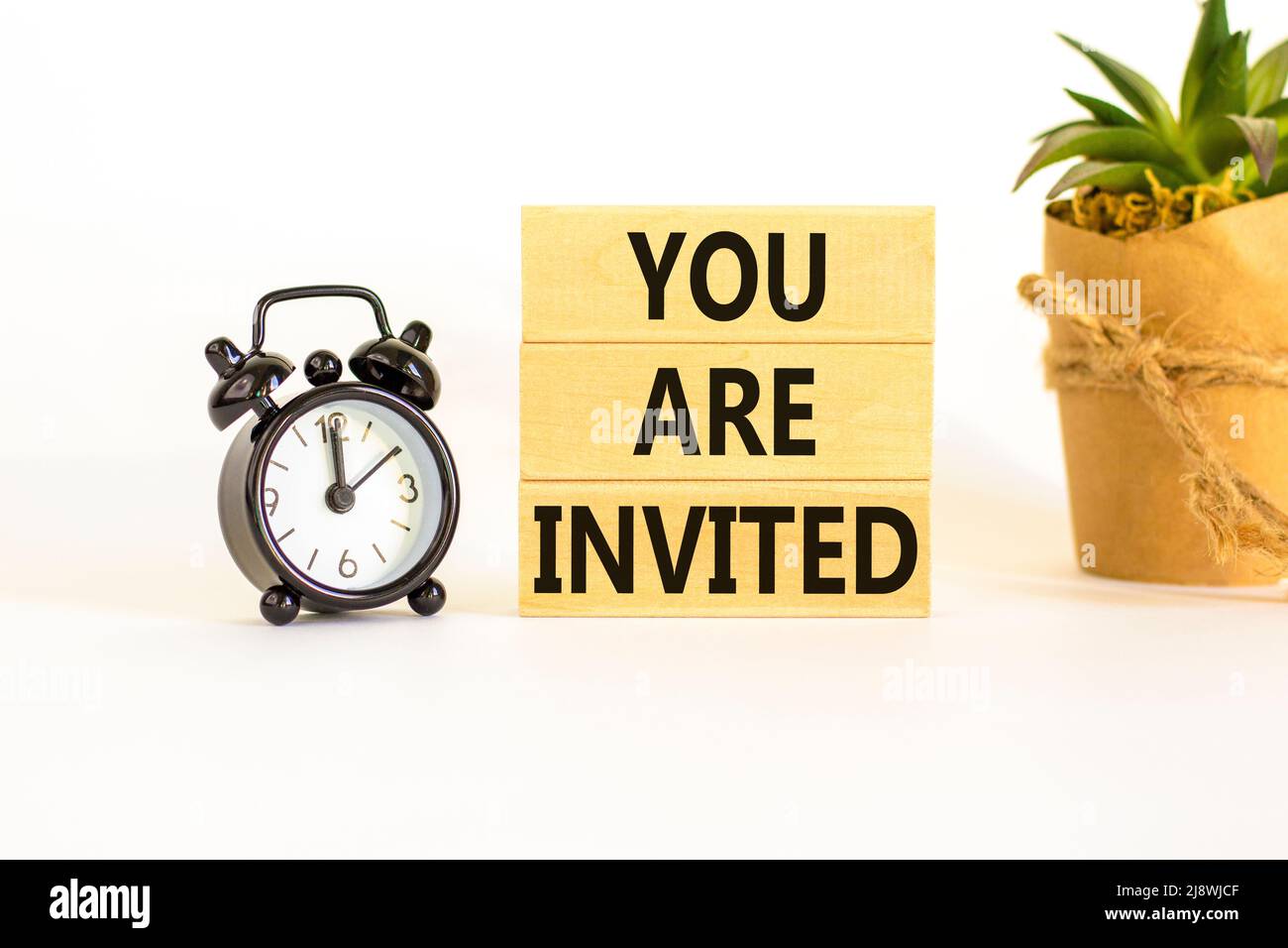 You are invited symbol. Concept words You are invited on wooden blocks ...