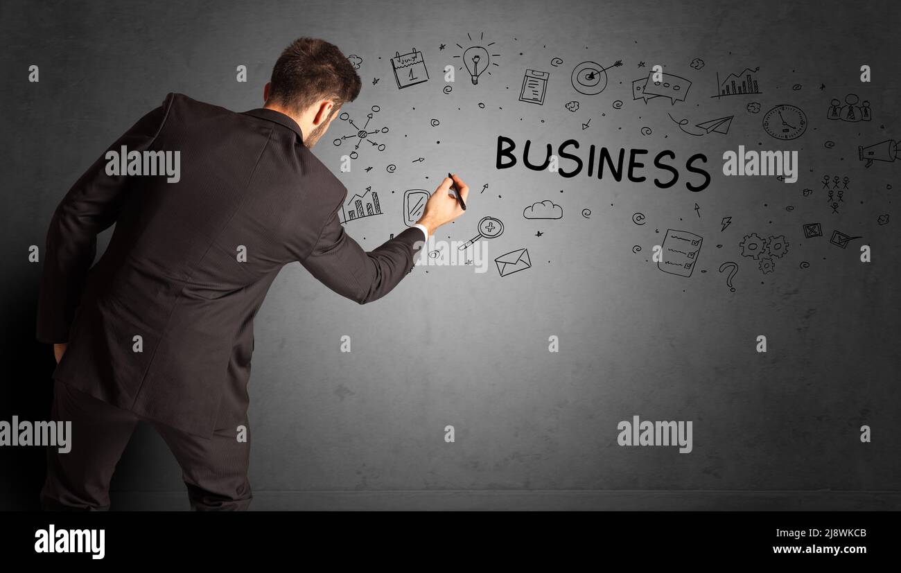 businessman drawing a creative idea sketch Stock Photo - Alamy