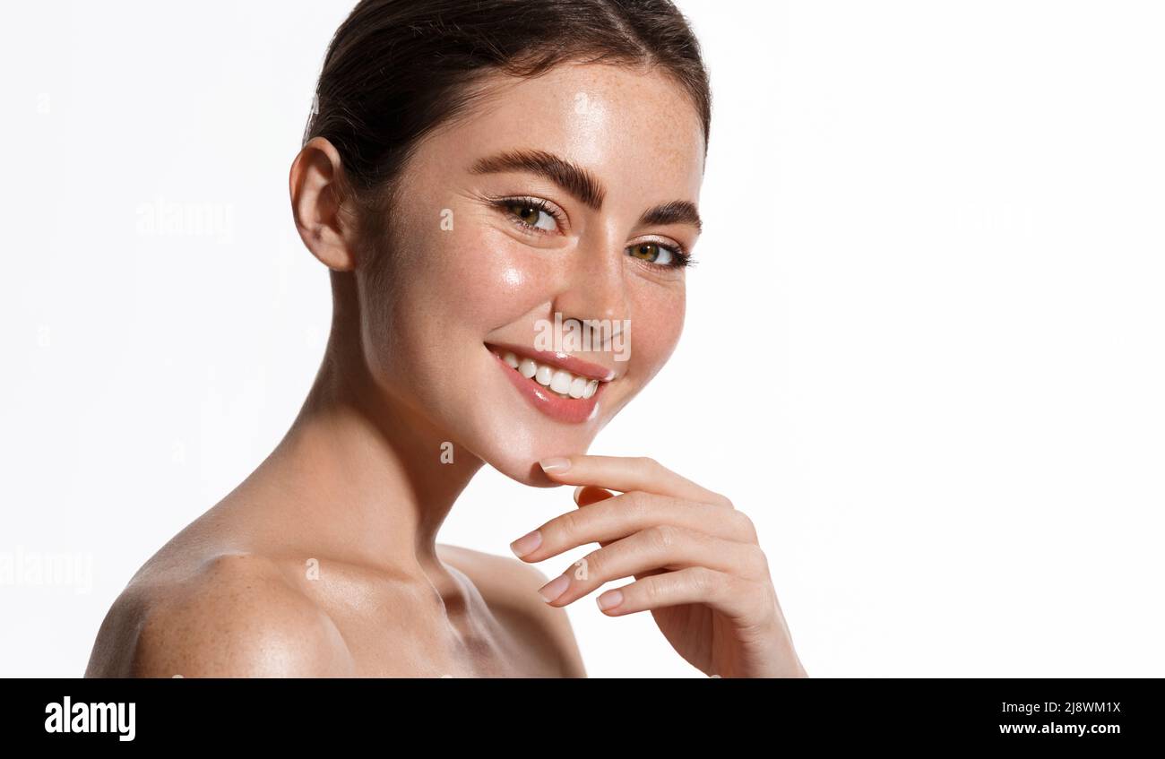 Women beauty and spa. Beautiful smiling brunette with thick eyebrows ...