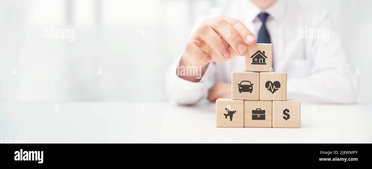 Social security concept. Insurance agent and wooden blocks with ...