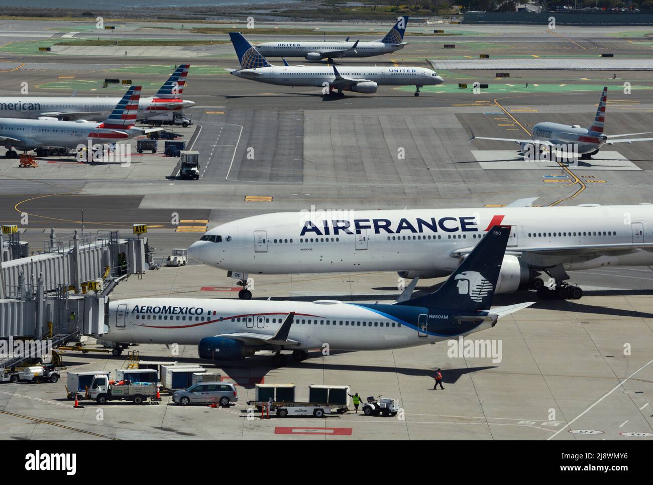 An Air France Boeing 777 passenger plane taxis to a gate at San ...