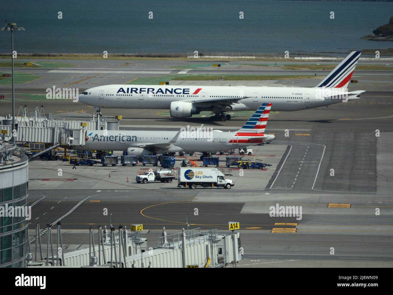 An Air France Boeing 777 passenger plane taxis to a gate at San ...