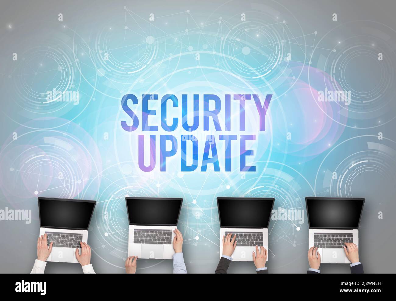 Group of people in front of a laptop, security concept Stock Photo - Alamy