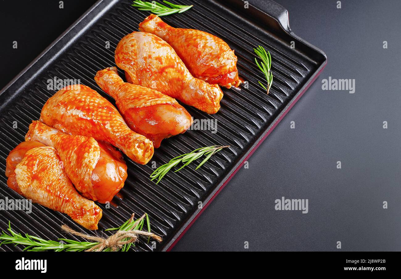 Convenience food, precooked.Raw Marinated chicken meat legs with spices ...