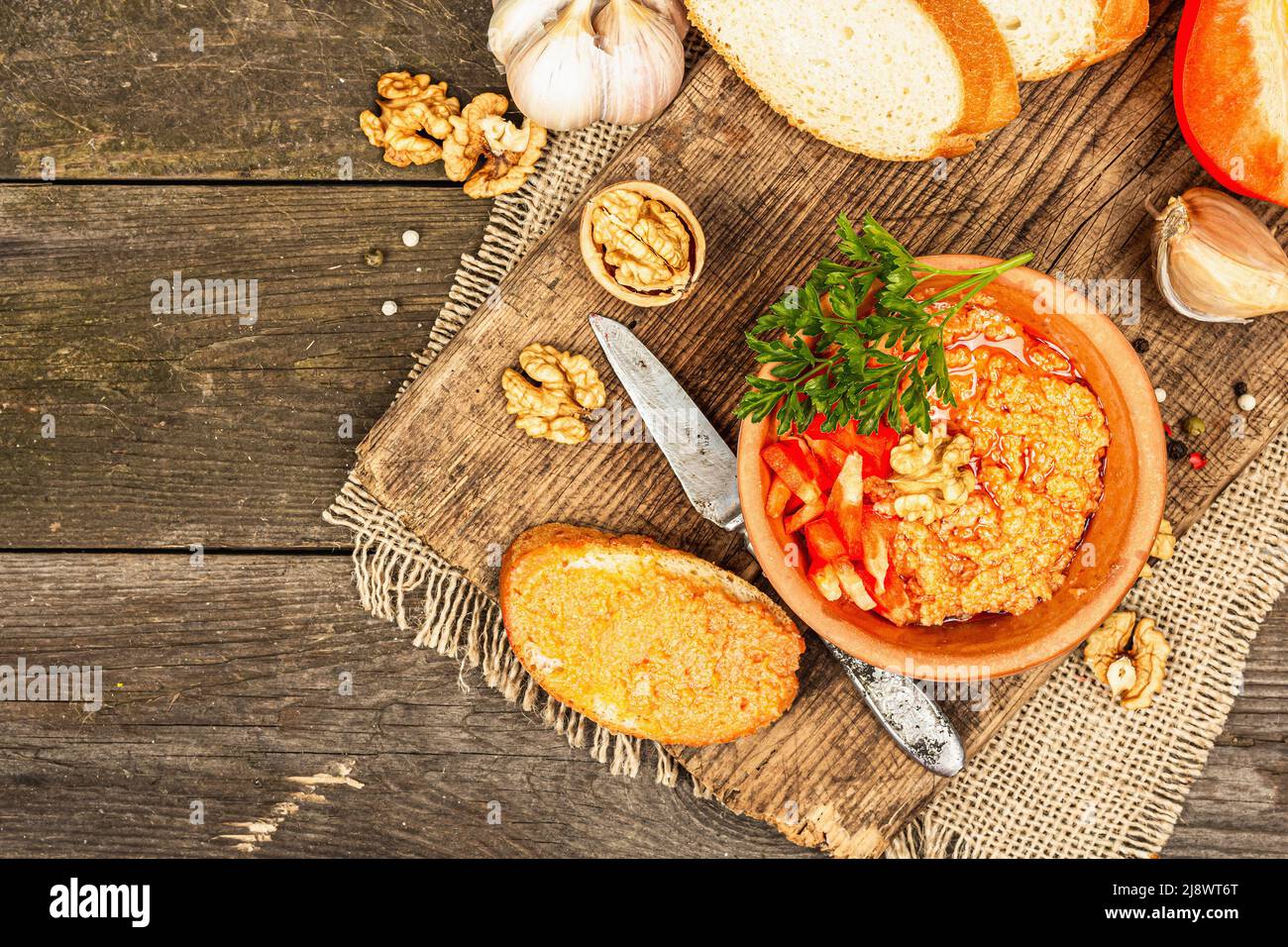 Traditional Middle Eastern dip Muhammara. Roasted red bell pepper with ...