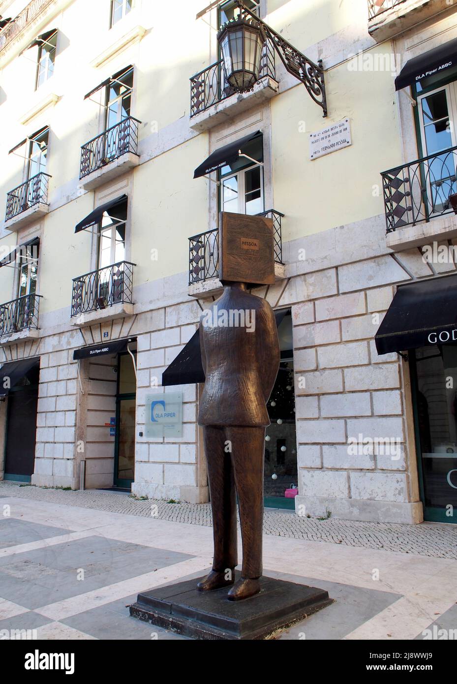 Street sculpture, homage to Fernando Pessoa, Portuguese poet, in front ...