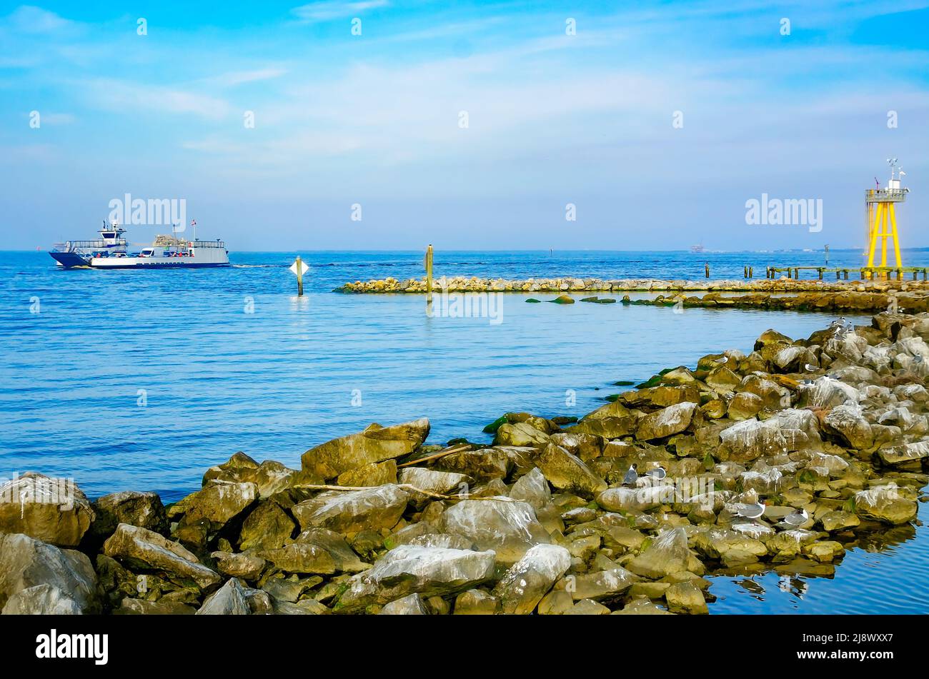 The Mobile Bay Ferry passes a rock jetty, April 28, 2022, in Dauphin ...