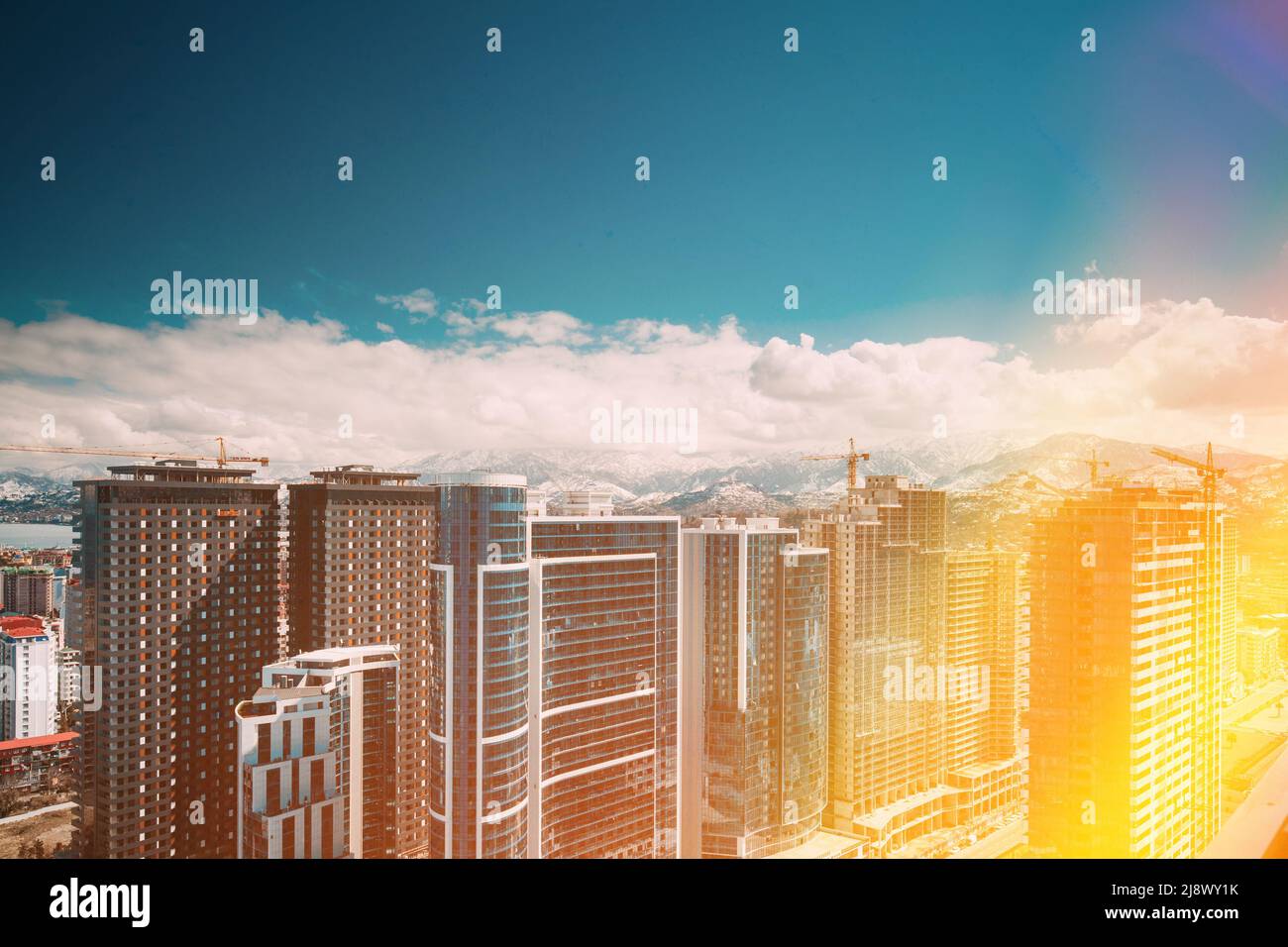 New Residential Multi-storey Houses On Blue Sky. Real Estate ...