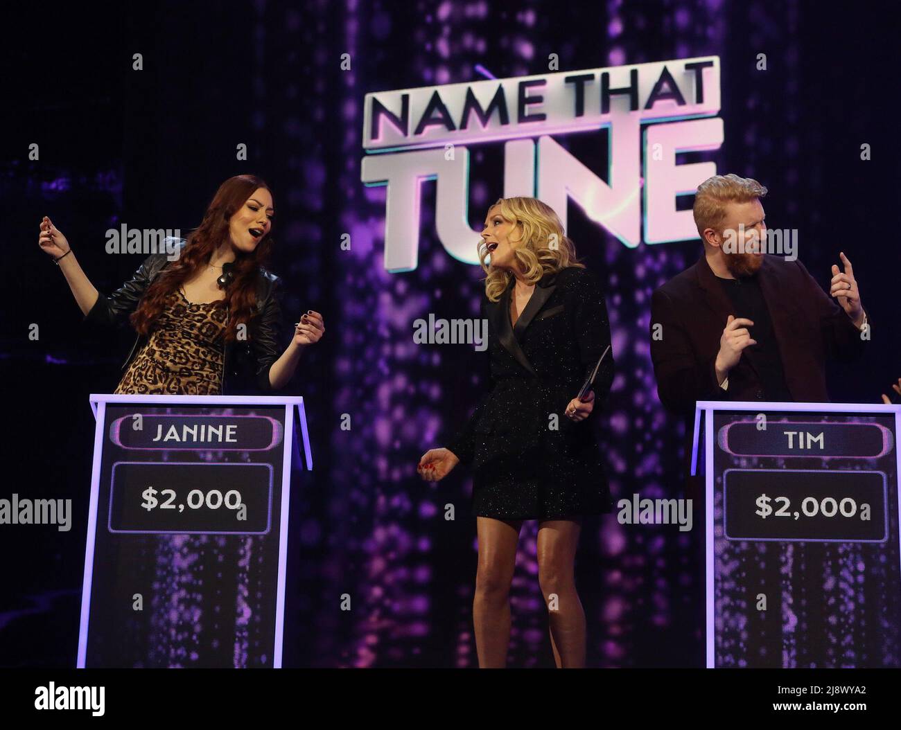 Name That Tune From Left Contestant Janine Host Jane Krakowski Contestant Tim Rock The